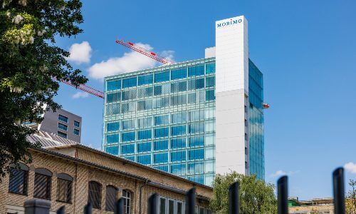 Mobimo erzielt mehr Gewinn und kauft weiter zu